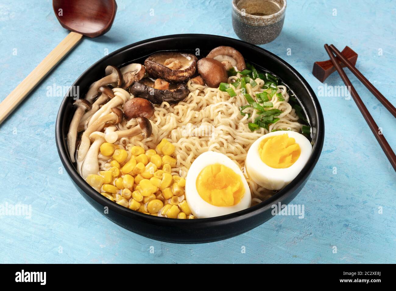 Ramen. Soba noodles with eggs, mushrooms, and vegetables, with sake ...
