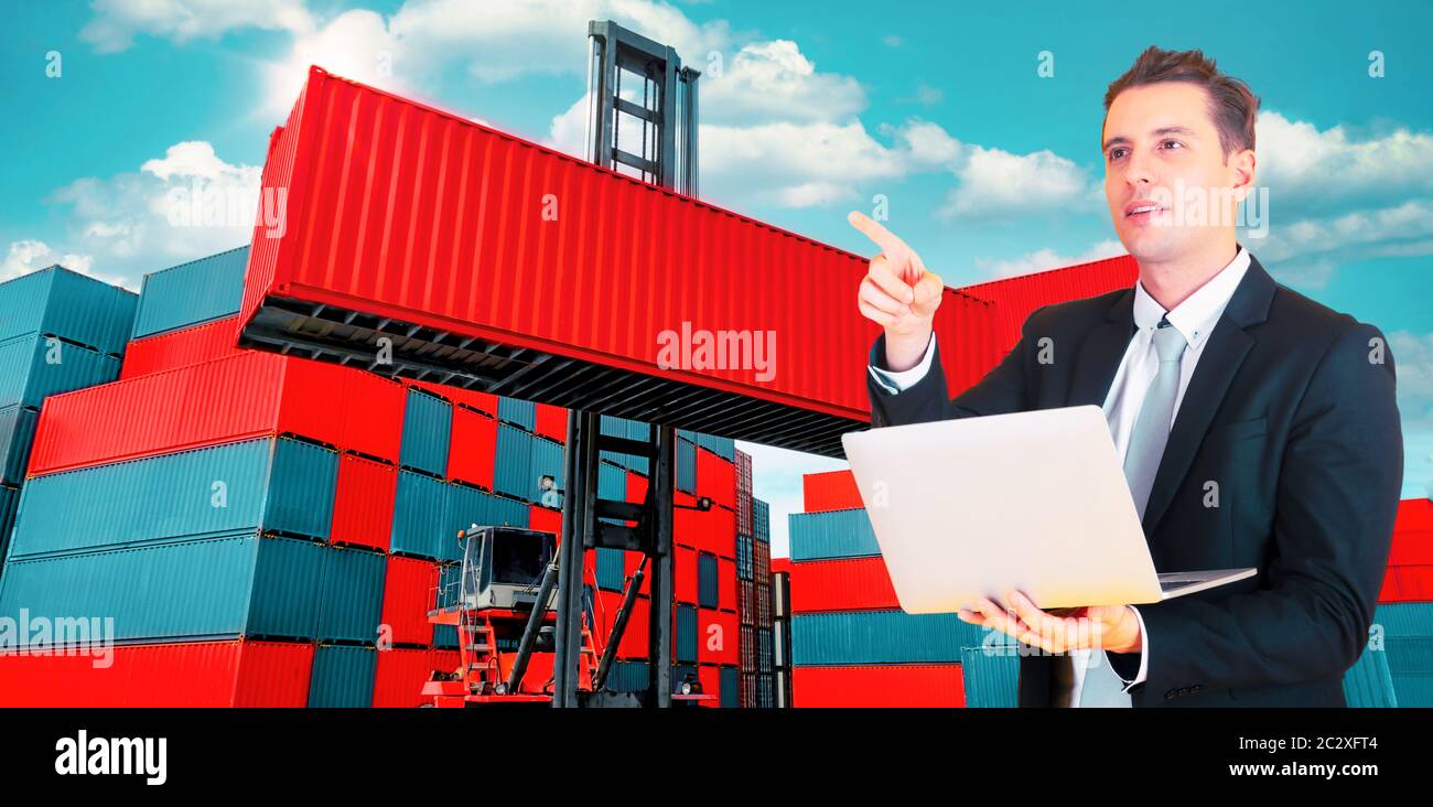 Foreman control loading containers box from cargo freight ship for ...