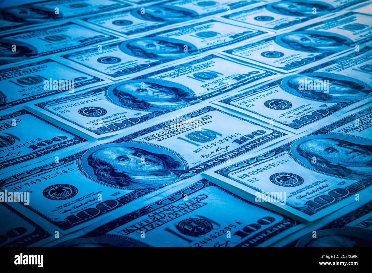 The background of a one hundred dollar bill. Style blue light Stock ...