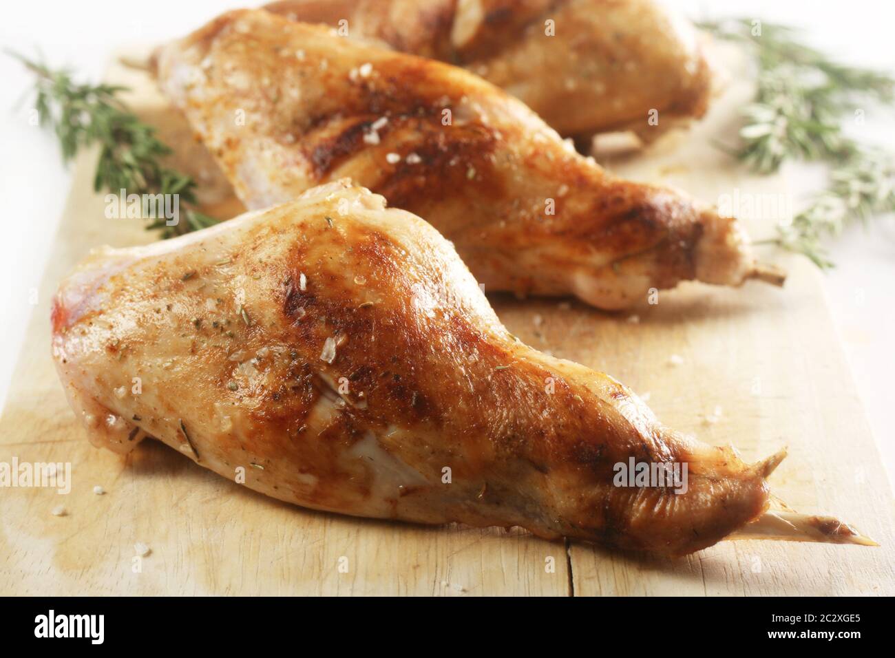 Roasted Rabbit Legs Stock Photo - Alamy