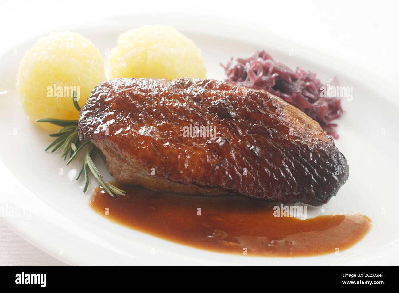 Duck With Red Cabbage And Dumplings Stock Photo - Alamy