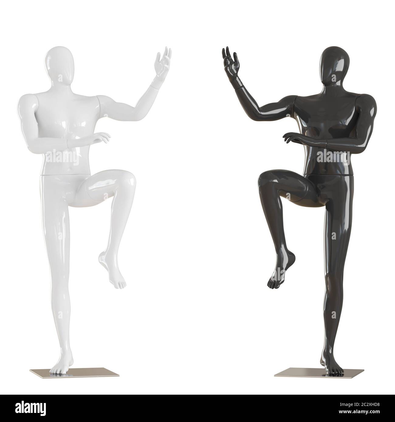 A black and white mannequins stands in a martial arts fighter stance ...