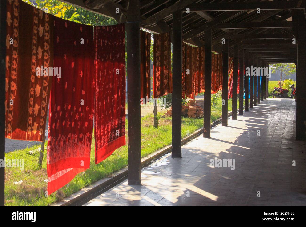 Batik fabric hanging dry in hi-res stock photography and images - Alamy