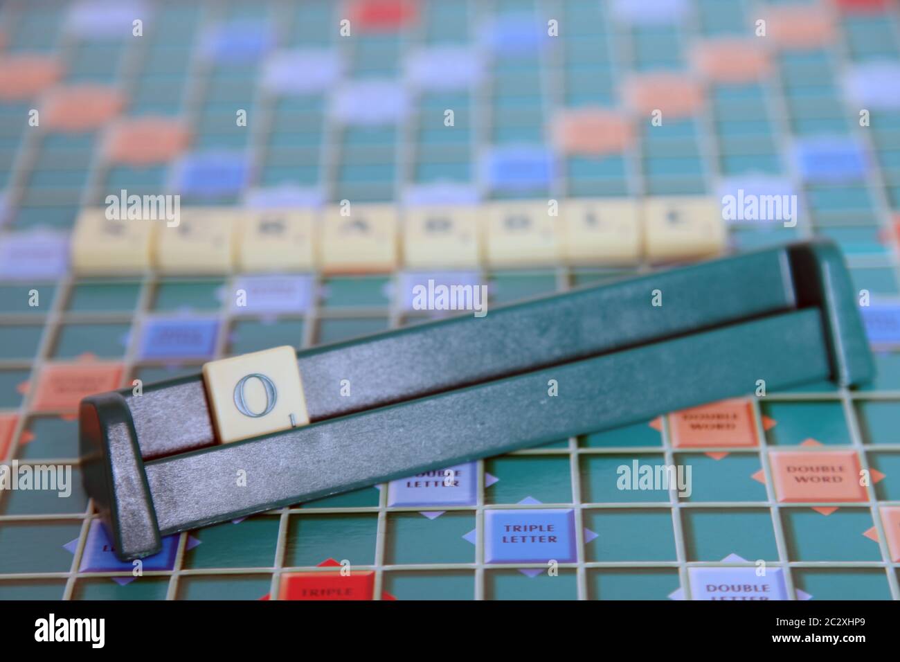 Scrabbles letters tile - letter character O Stock Photo - Alamy