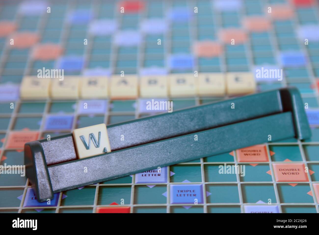 Scrabbles letters tile - letter character W Stock Photo - Alamy