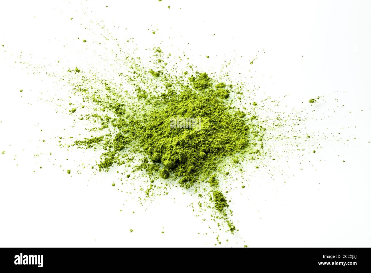 Matcha powder explosion on white background. Matcha is made of finely ...