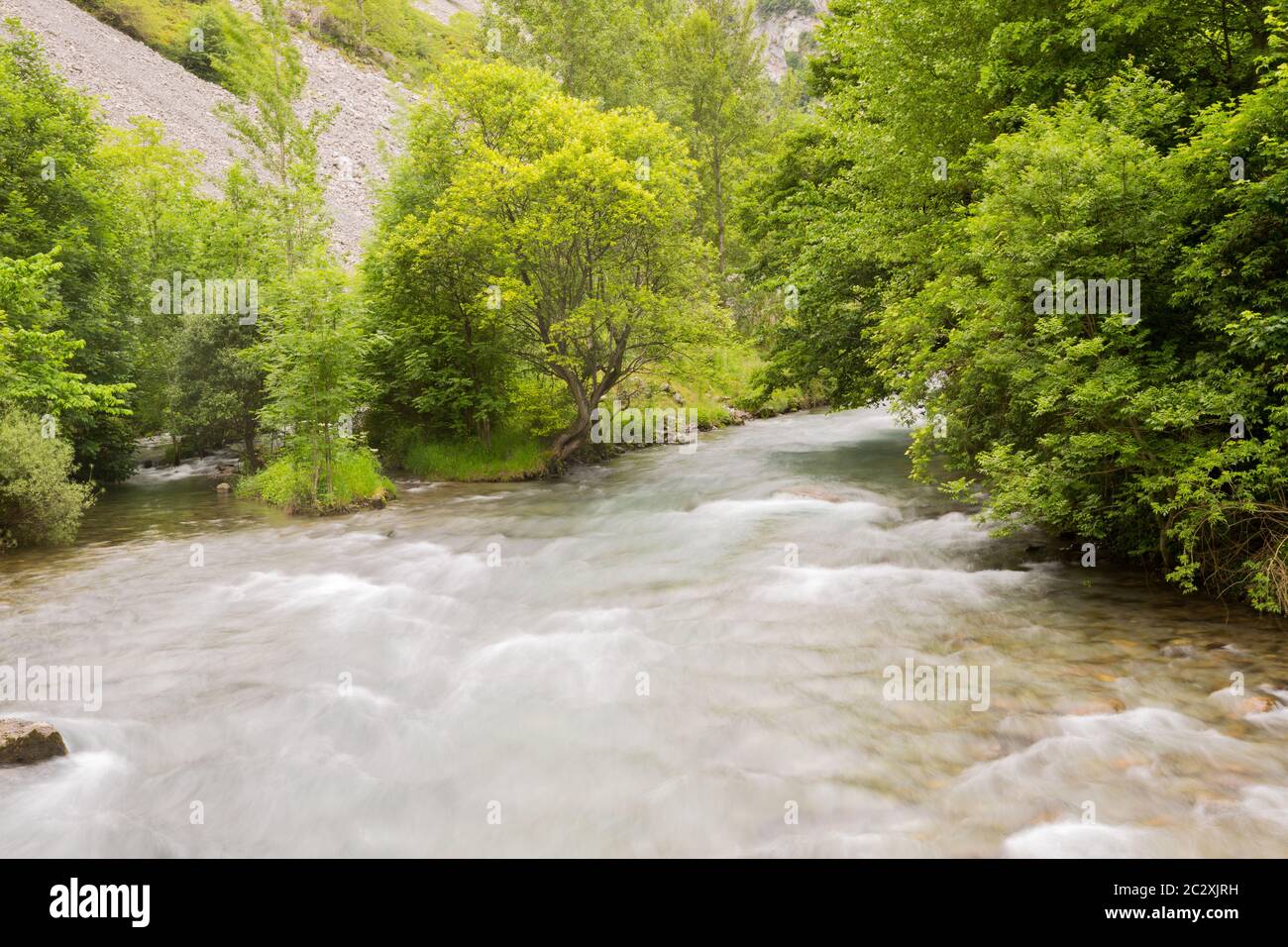 Waterfall in the Cares River located in the Picos de Europa National ...