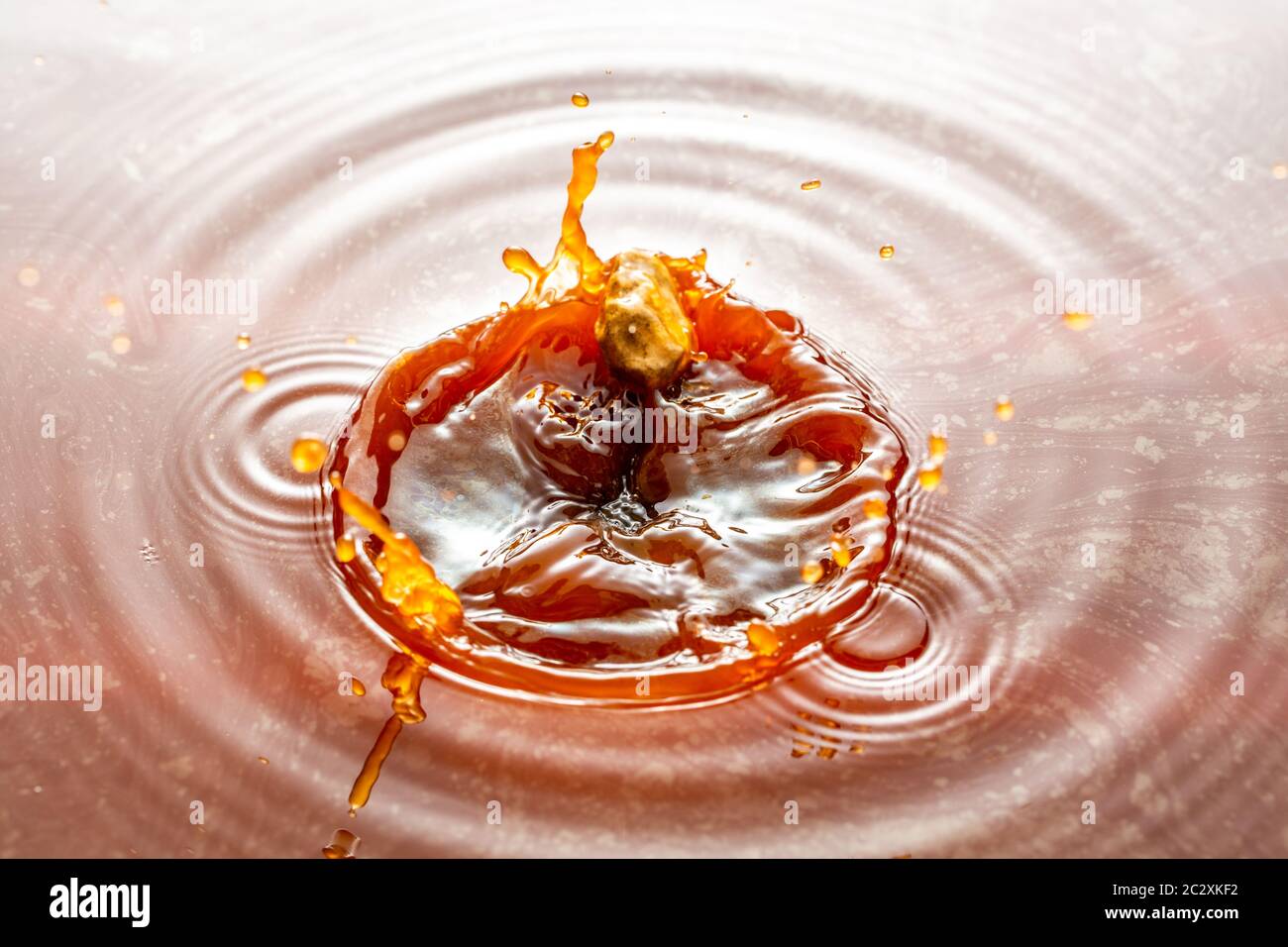 Rusty water drops splashing in dirty oily water, drops of stagnant ...