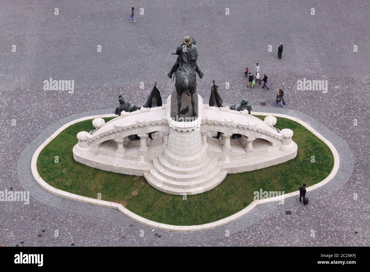 Tourists at Mathias Rex statue in Cluj-Napoca, Romania. Travelers with ...