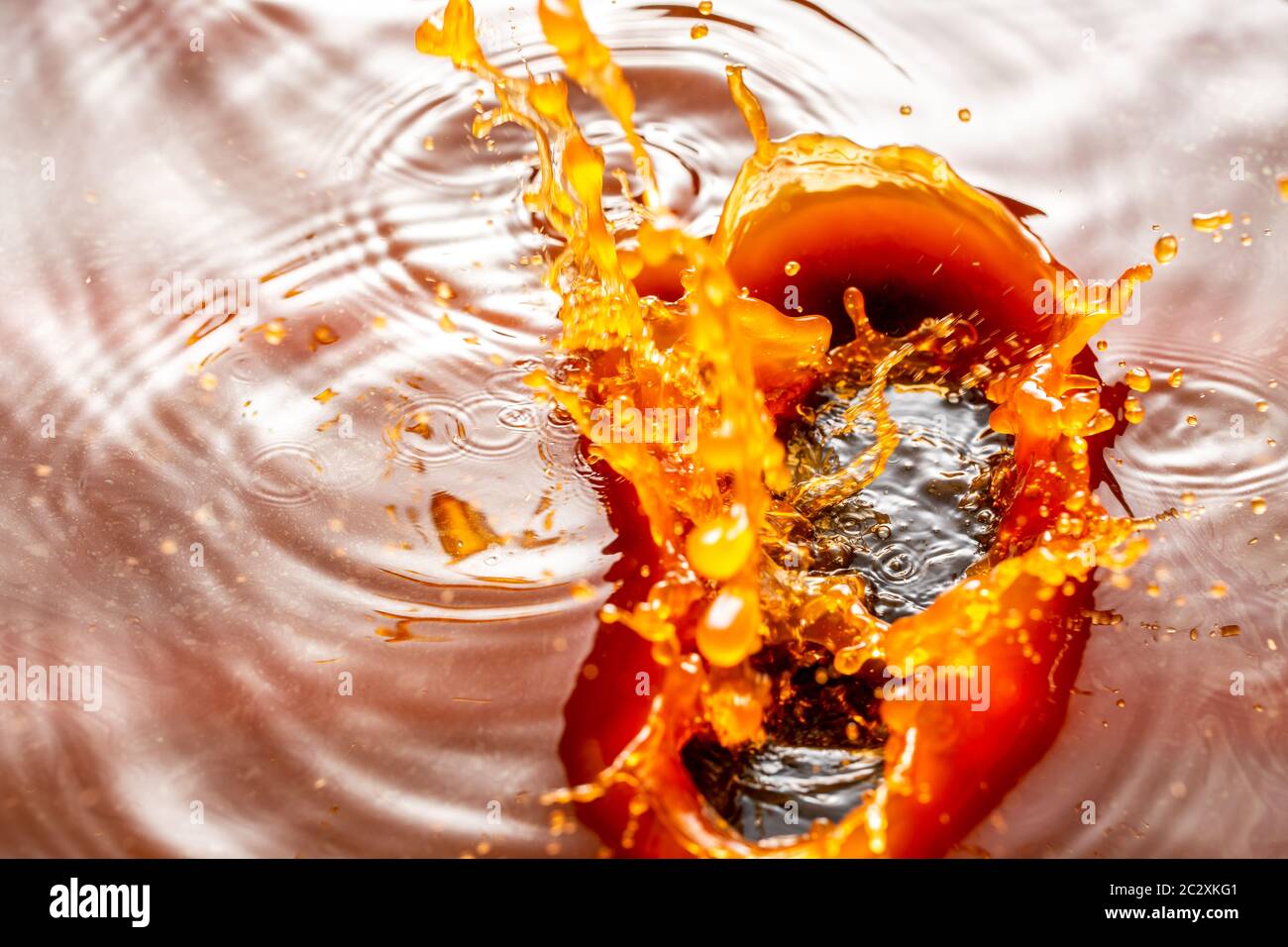 Rusty water drops splashing in dirty oily water, drops of stagnant ...