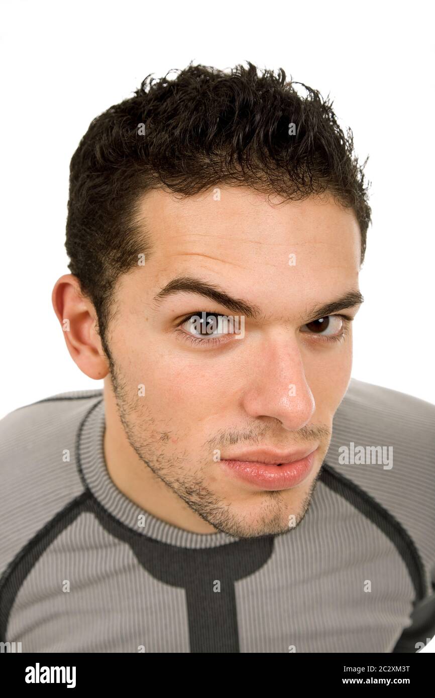 young silly man portrait in a white background Stock Photo - Alamy