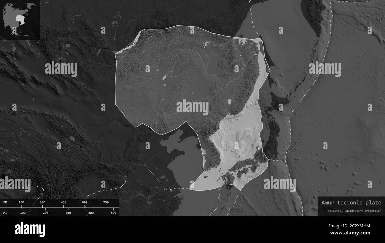 Amur plate shape outlined on a darkened and desaturated background of ...
