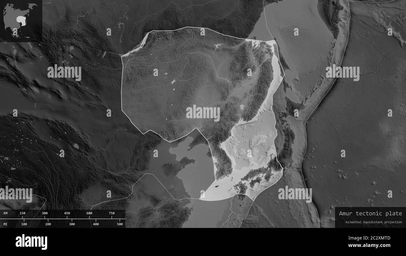 Amur plate shape outlined on a darkened and desaturated background of ...