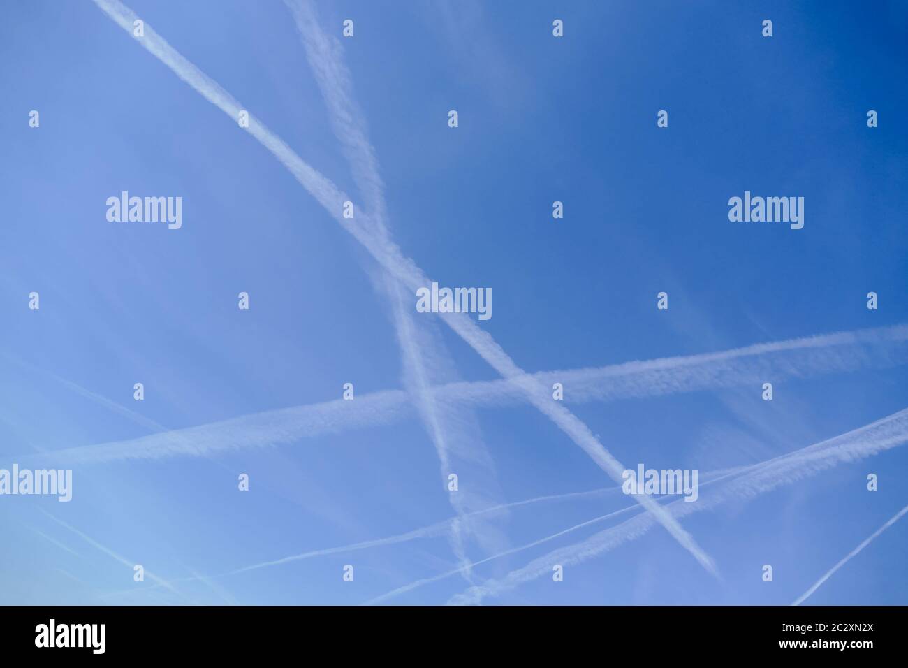 Photo of Airplanes crossing paths in the air Stock Photo - Alamy