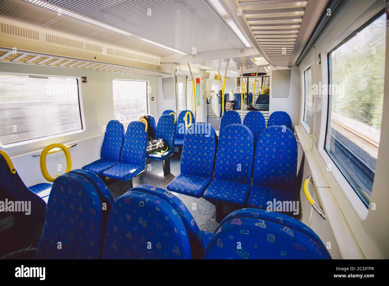Interior inside the seat of blue in a regional train in Sweden. Concept ...