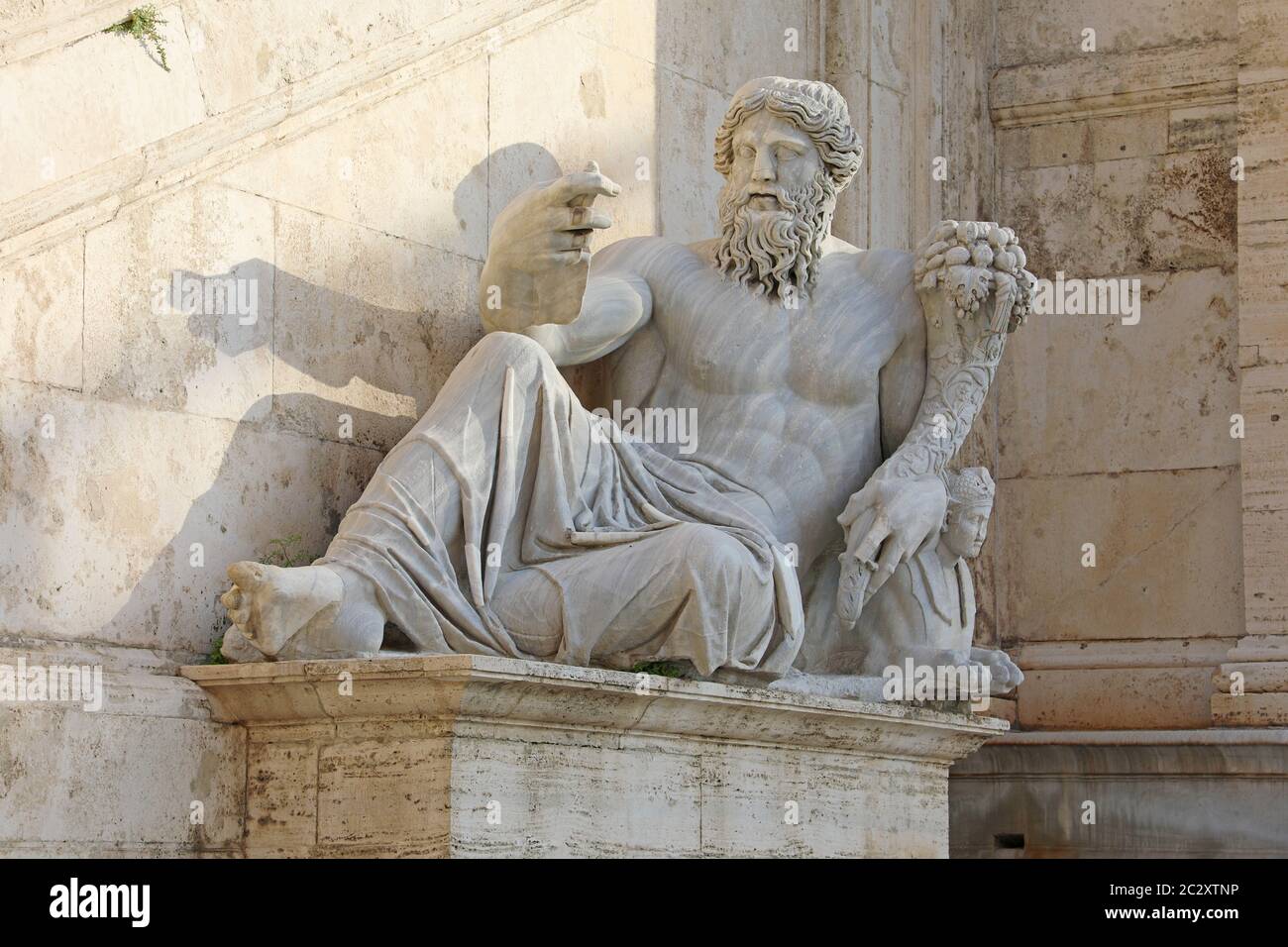 Statue of Hapi, The Nile River god. The statues on either side of the ...