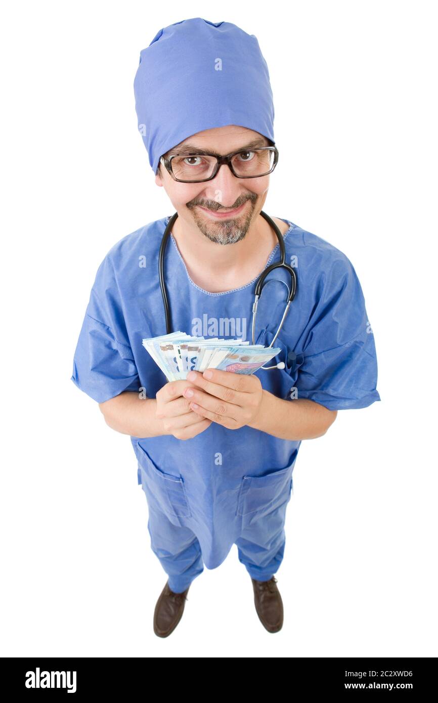 silly male doctor full length with money, isolated on white background ...