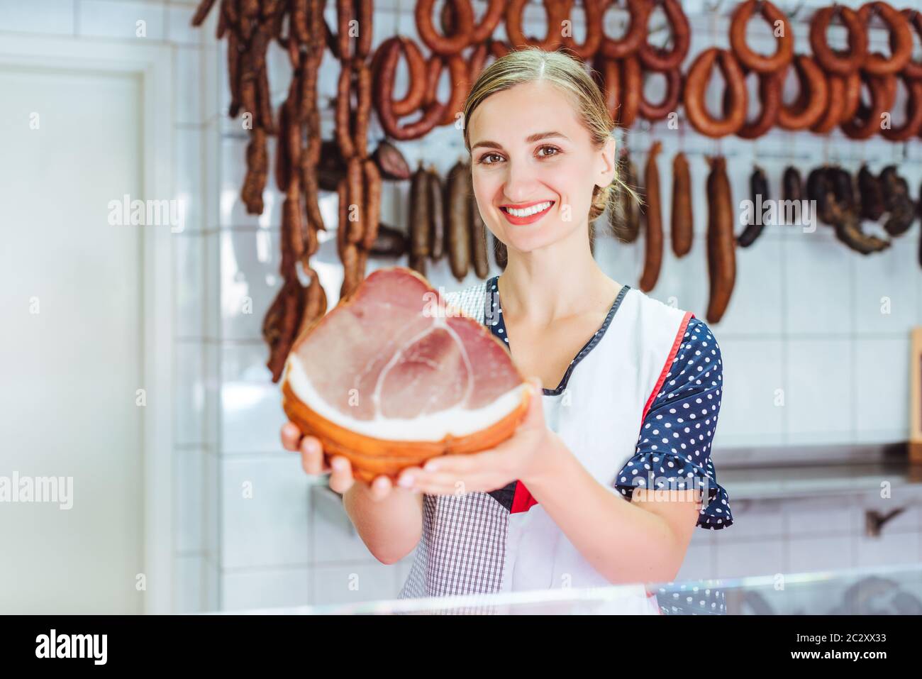 Butcher showing meat customer butchery hi-res stock photography and ...