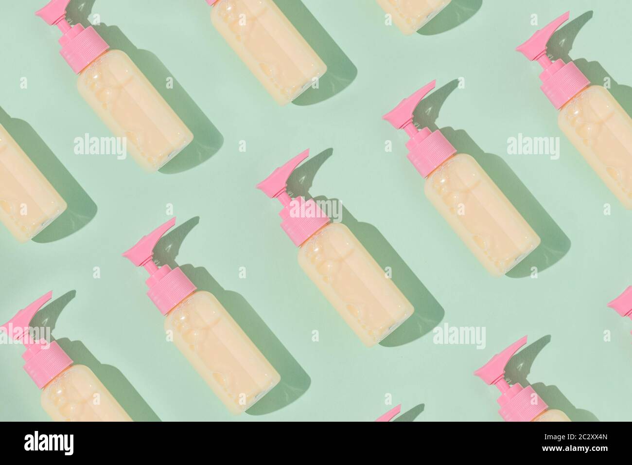 Liquid soup pattern in a green background Stock Photo - Alamy