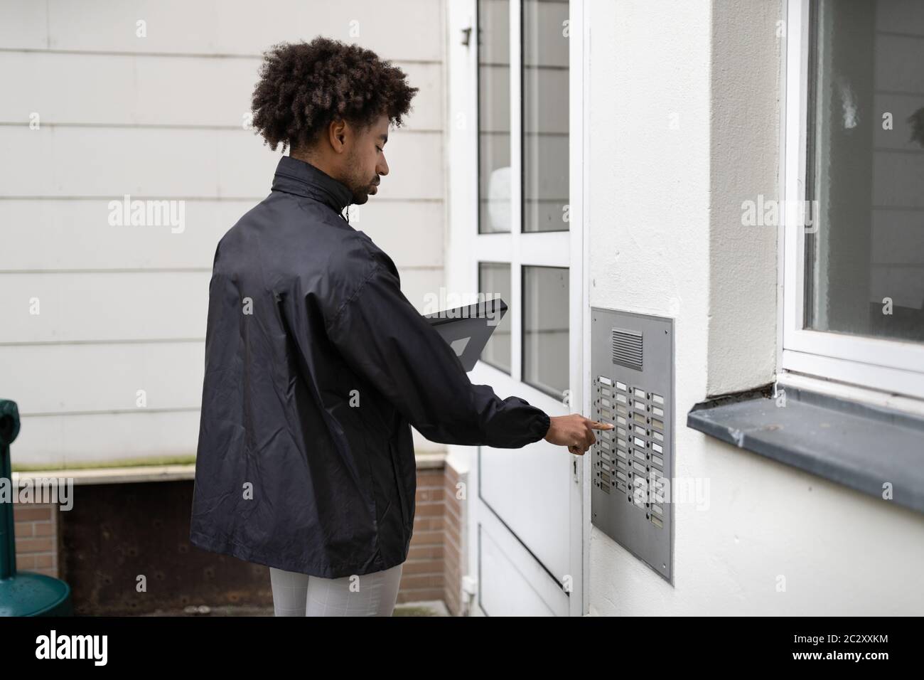 Ringing the front door bell hi-res stock photography and images - Alamy