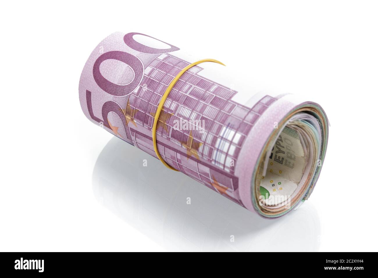 Money roll of Euro banknotes, 500 Euro on top, isolated on white ...