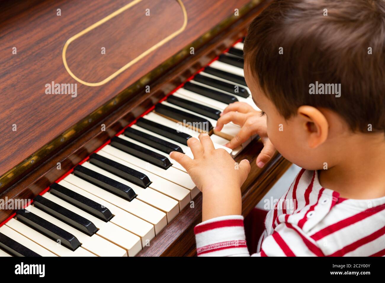 Kid piano hi-res stock photography and images - Alamy