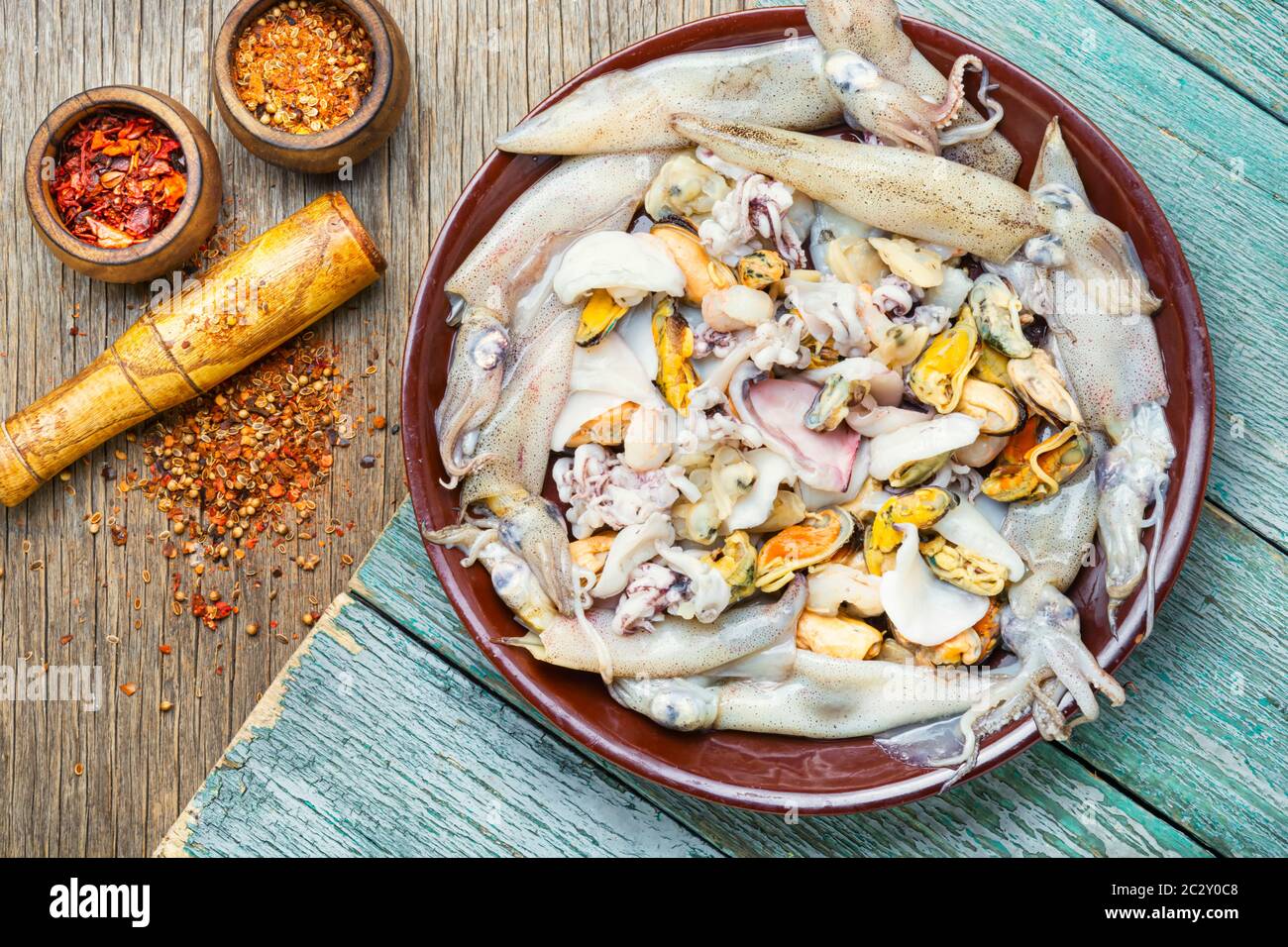 Raw seafood with fresh mussels,clams,squid, shrimps and spice.Healthy ...