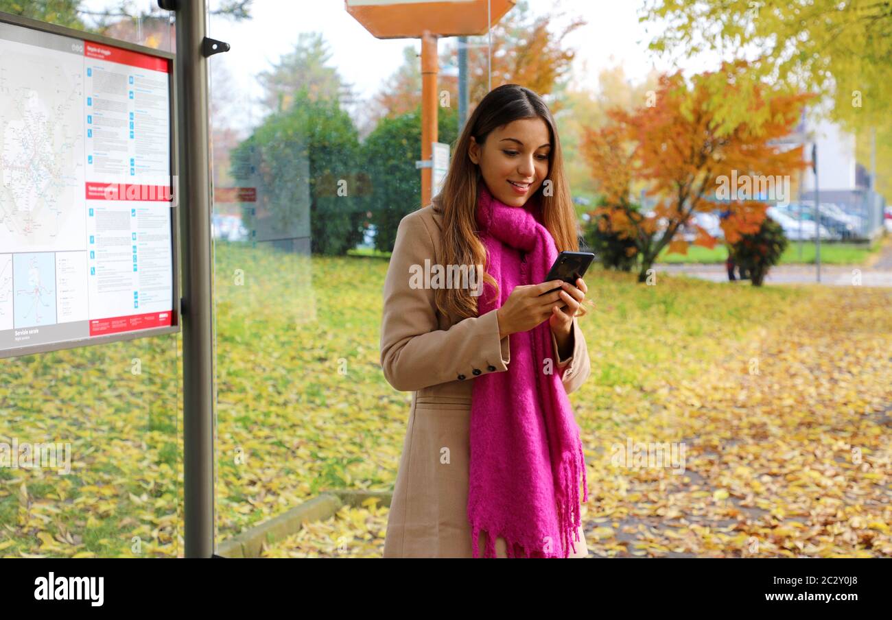People and public transport. Young woman messaging with mobile phone ...