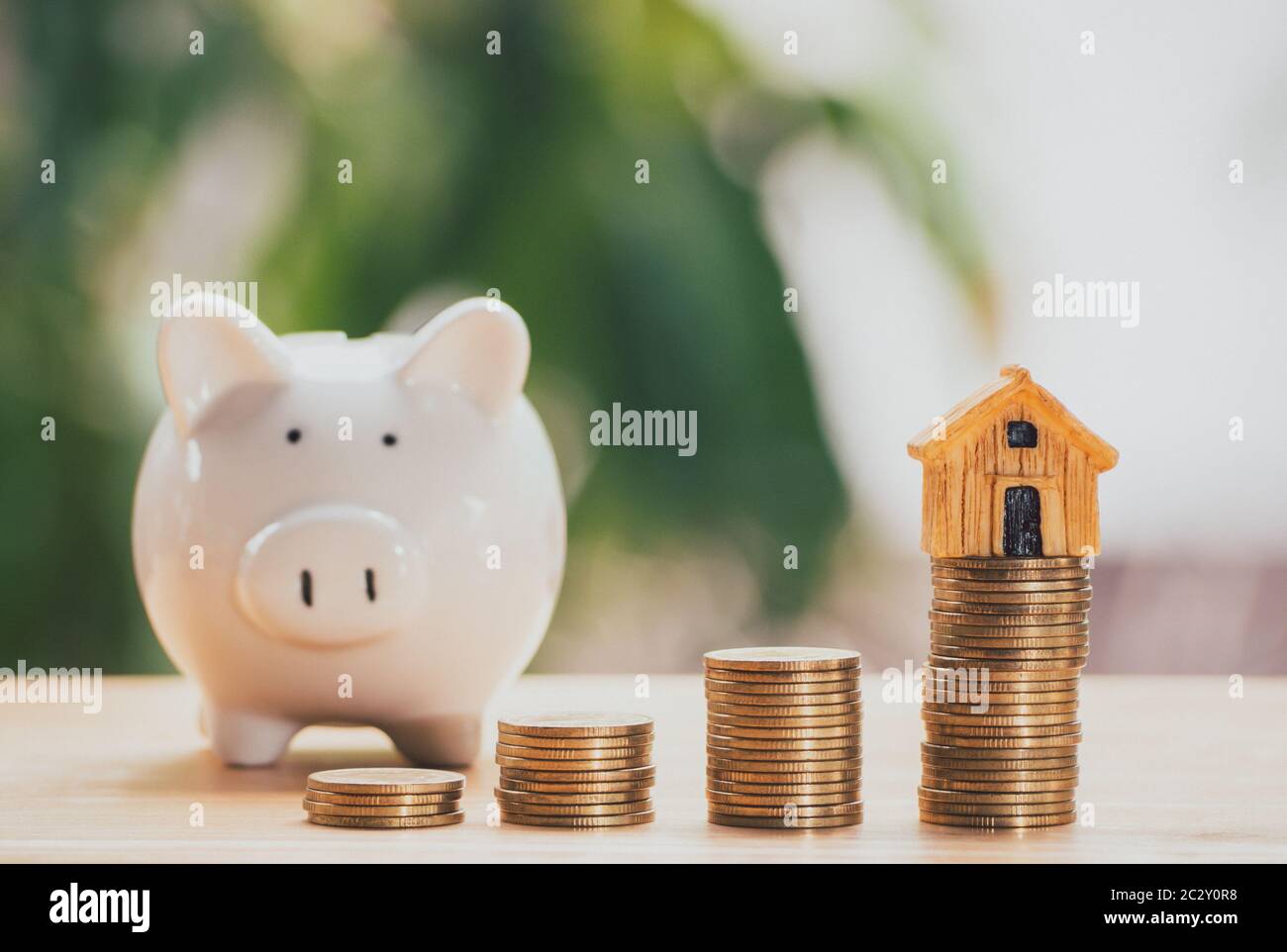 Stack of dollar bills house High Resolution Stock Photography and ...