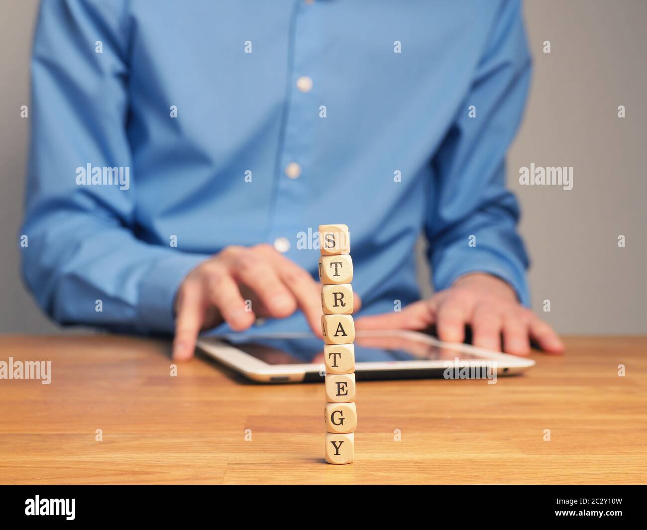 Business concept with small wooden blocks on an office table Stock ...