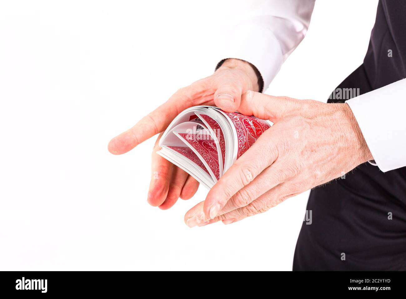 hands are mixing a deck of cards in close up Stock Photo - Alamy