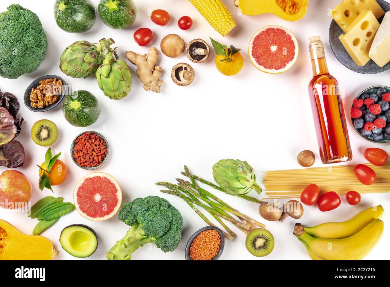 Vegetarian food background, a flat lay of fruits, vegetables, legumes ...