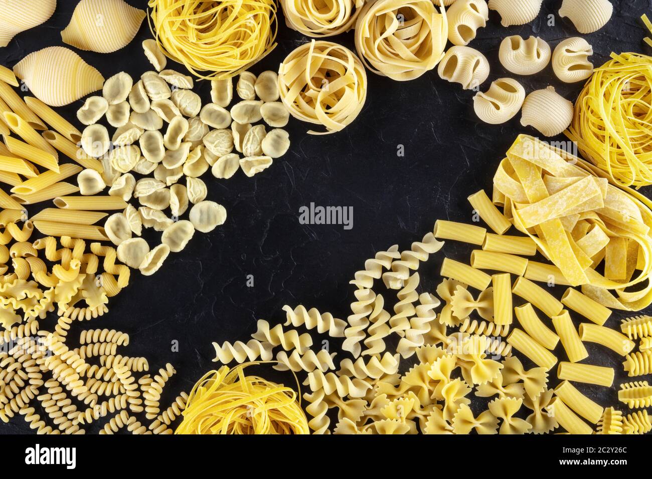 Italian pasta design with copy space, a flat lay of a variety of pasta ...