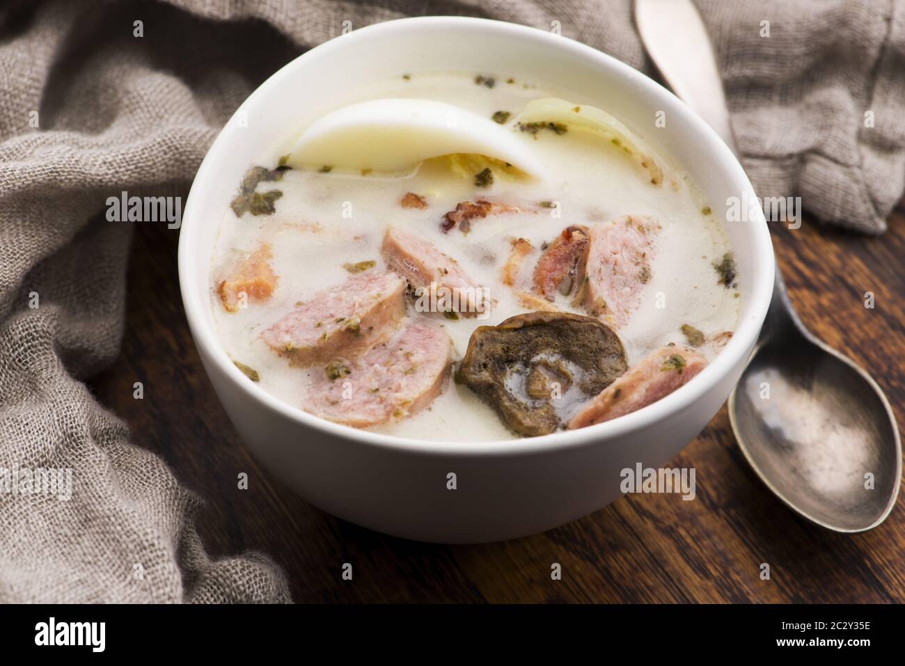 Traditional easter white borscht with eggs and sausage Stock Photo - Alamy