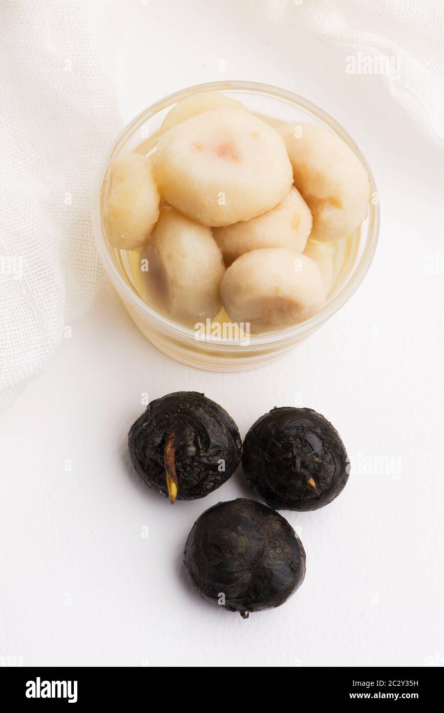 Peeled water chestnuts, tasty ingredients for a Chinese meal Stock ...
