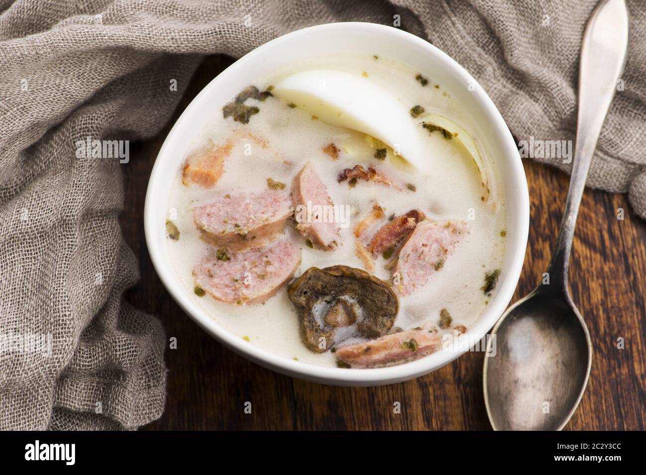 Traditional easter white borscht with eggs and sausage Stock Photo - Alamy