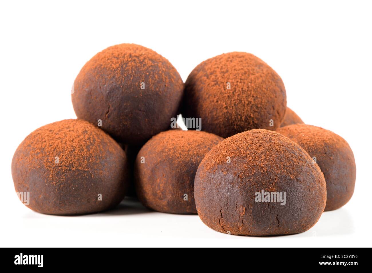 Chocolate truffles isolated on white background Stock Photo - Alamy