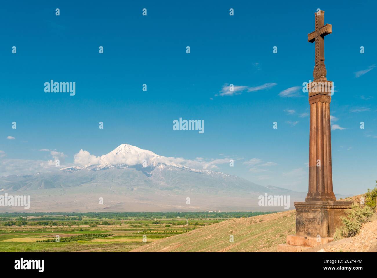 Mount Ararat and the cross on the territory of the monastery of Khor Virap, a beautiful Armenian ...