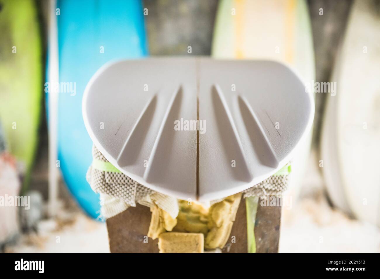 Surfboard Shaper refining a new design Stock Photo - Alamy