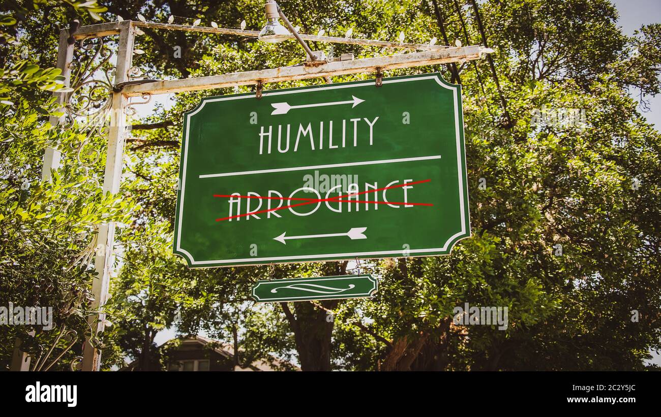 Street Sign to Humility versus Arrogance Stock Photo - Alamy