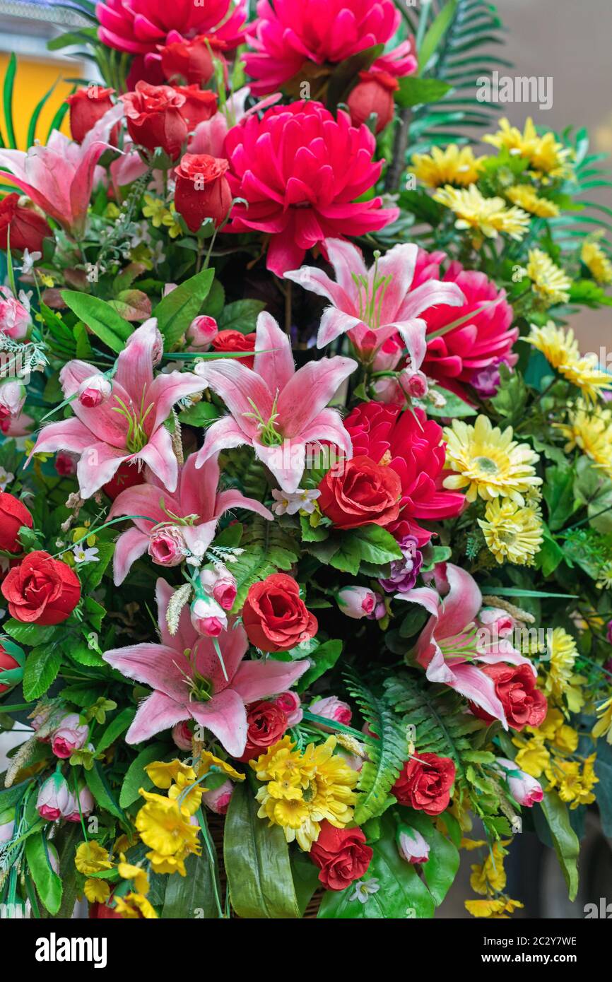 Realistic Bouquet of Artificial Colourful Flowers Decor Stock Photo - Alamy