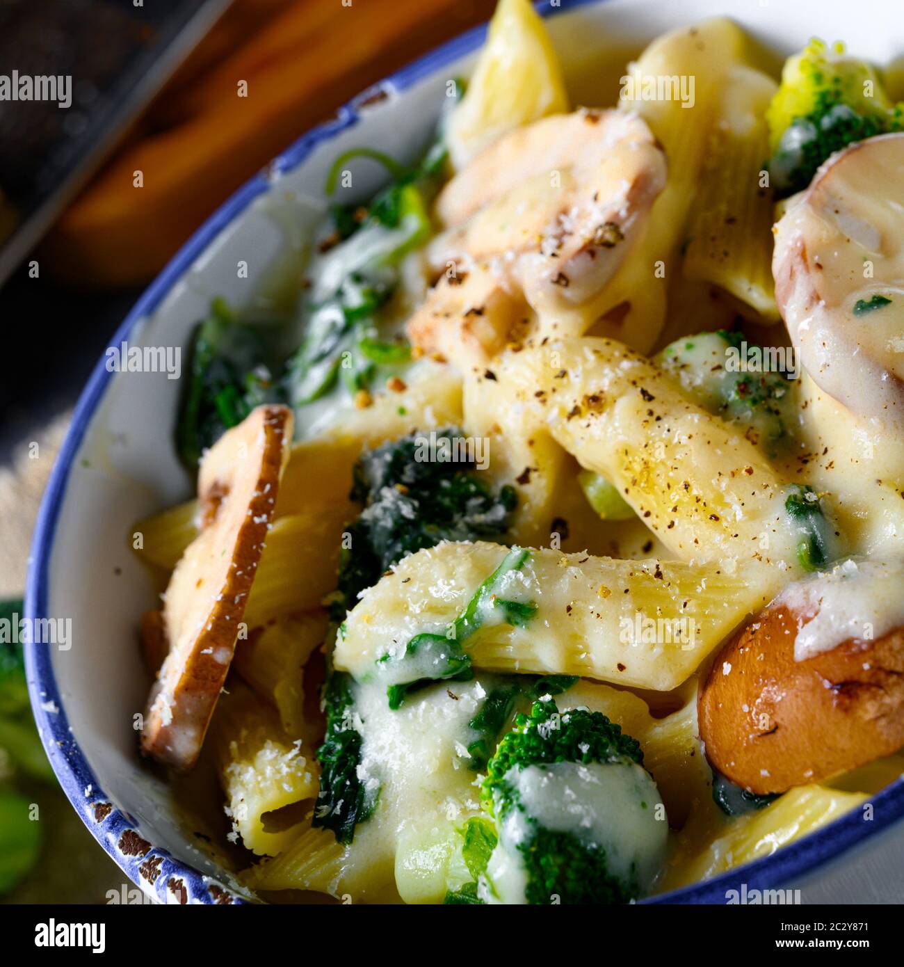 Real pasta with mushrooms, spinach and broccoli Stock Photo - Alamy