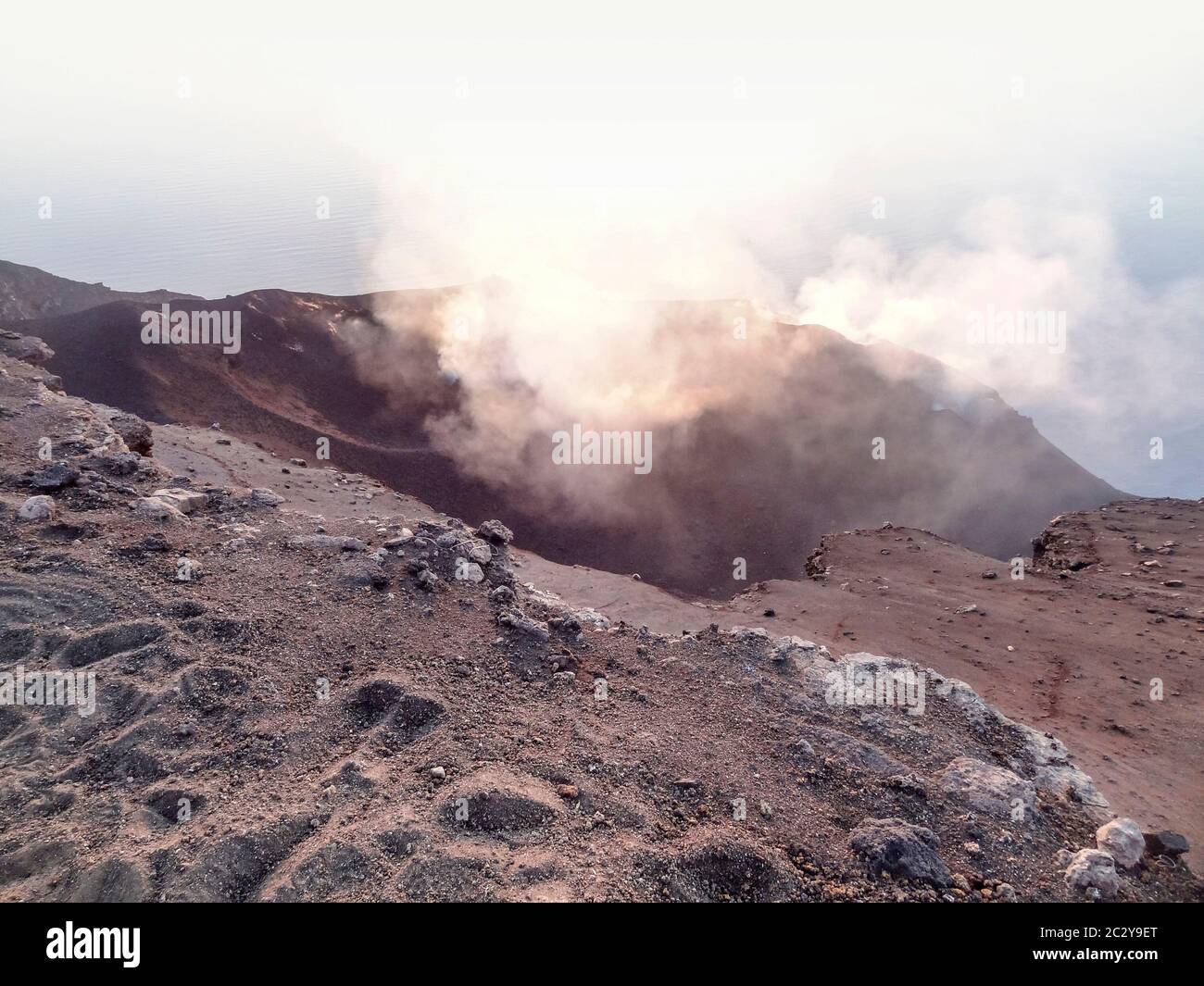Stromboli volcano with cloud formation hi-res stock photography and ...