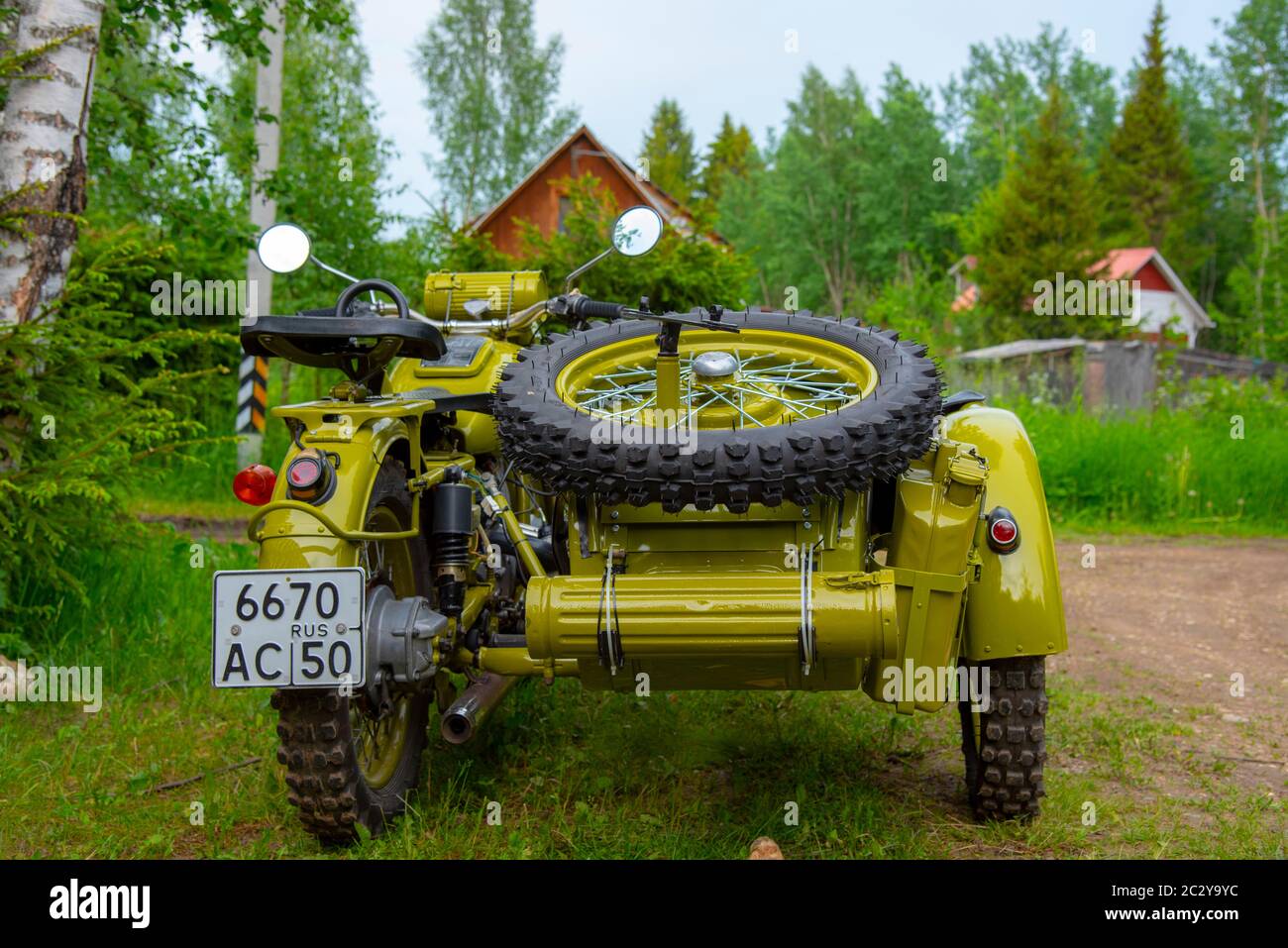 Restored bright green retro motorcycle with sidecar Stock Photo - Alamy