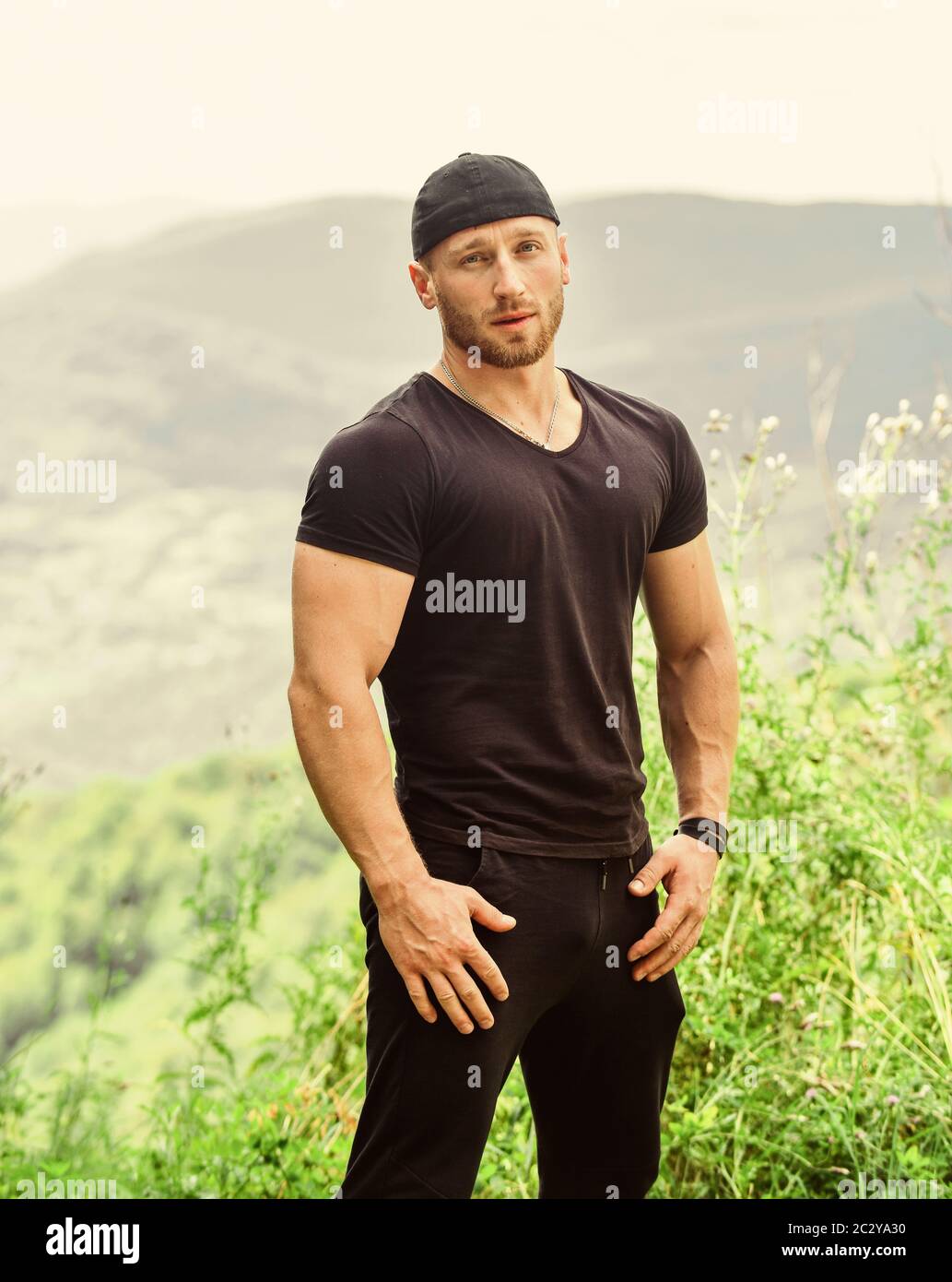 Masculinity and male energy. Man muscular bodybuilder mountain ...