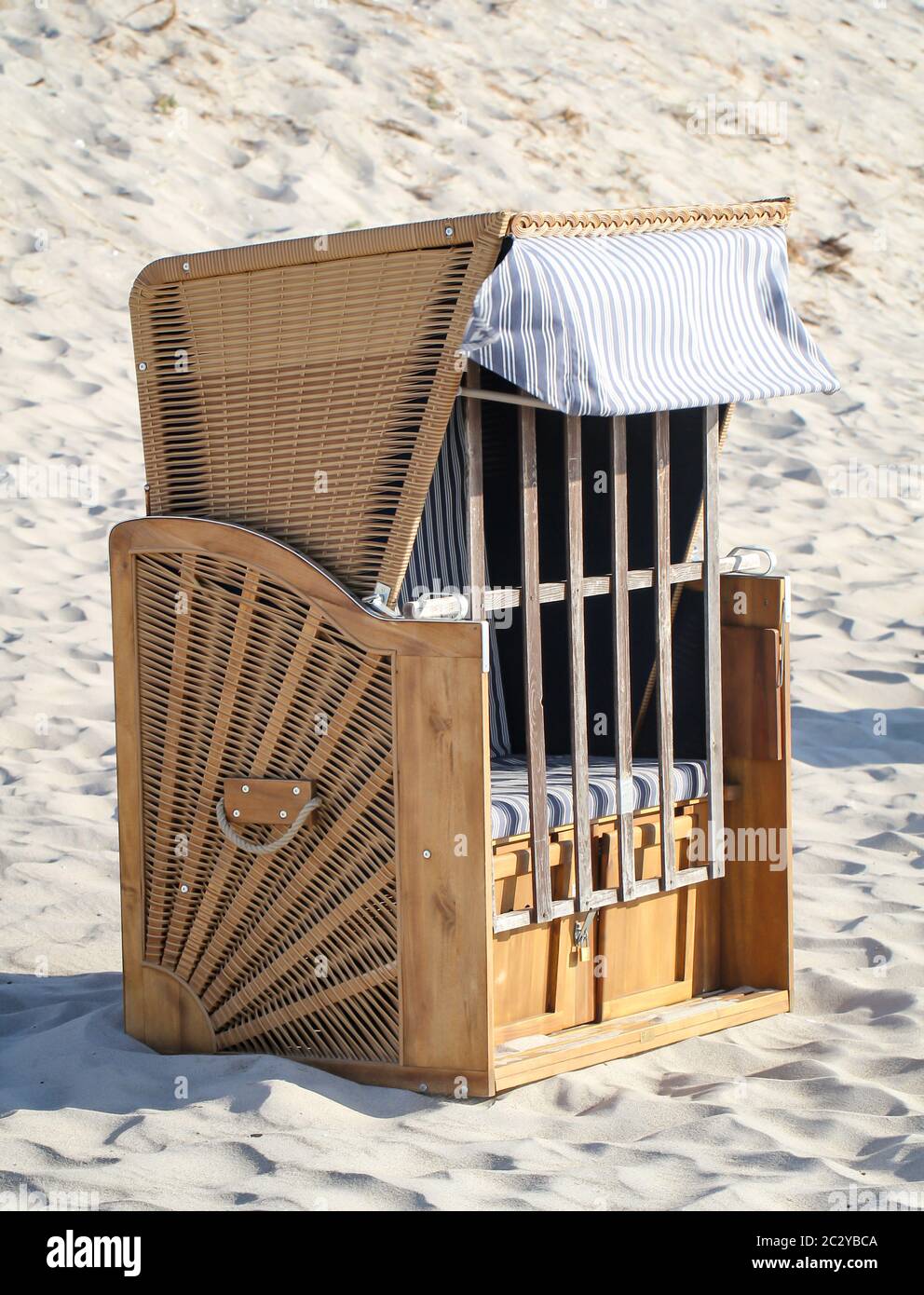 a locked beach chair stands lonely on the beach of the Baltic Sea Stock ...