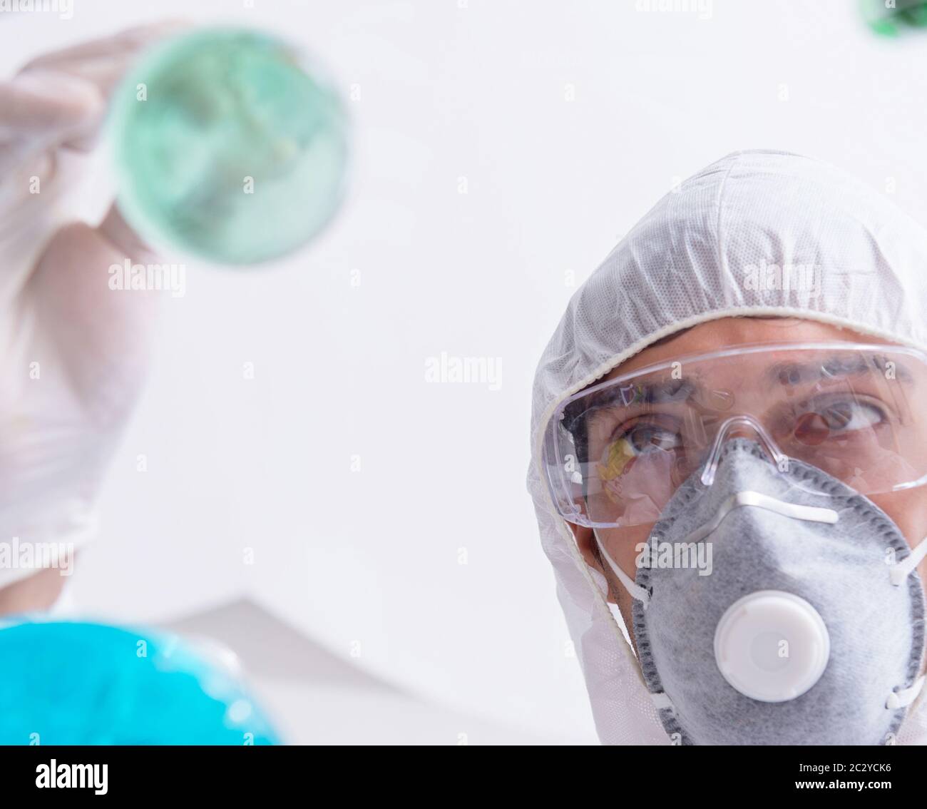 Chemist working in the laboratory with hazardous chemicals Stock Photo ...