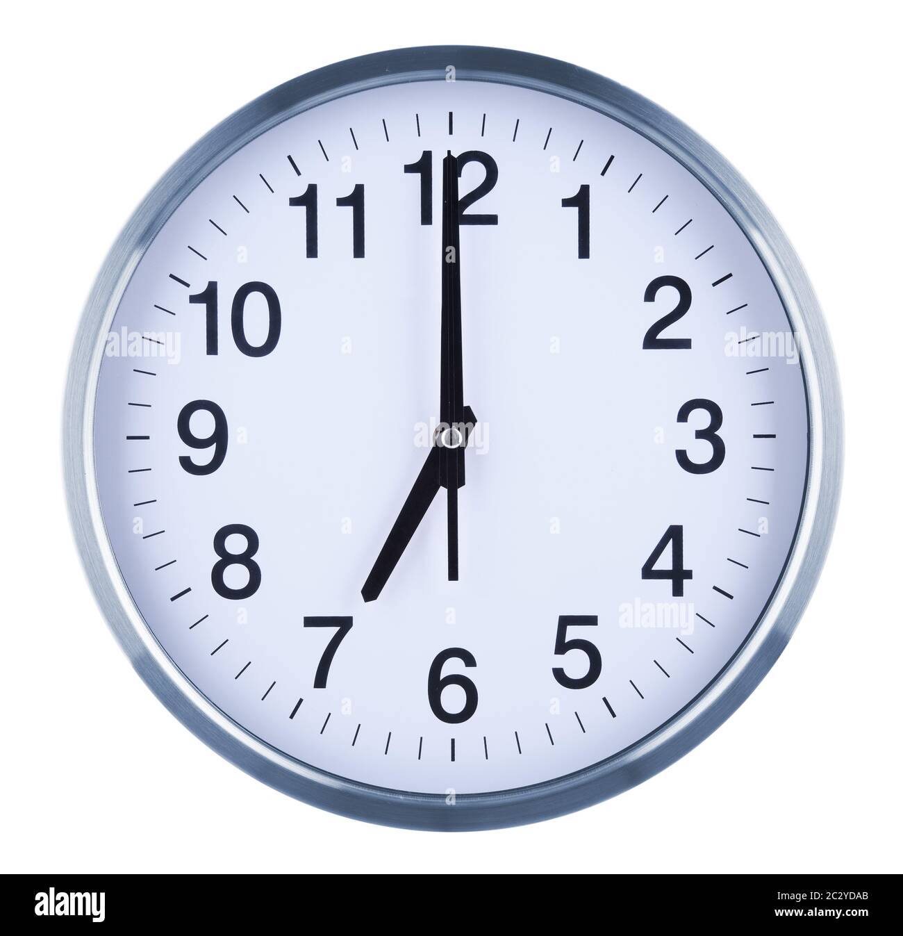 Wall clock isolated on white background. Seven oclock Stock Photo - Alamy