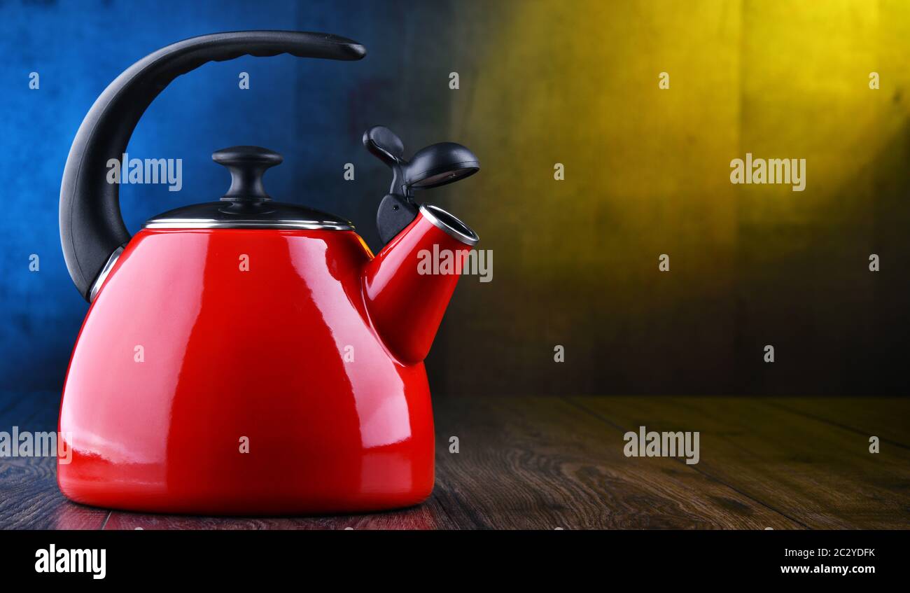 Traditional stainless steel stovetop kettle with whistle of two litres ...