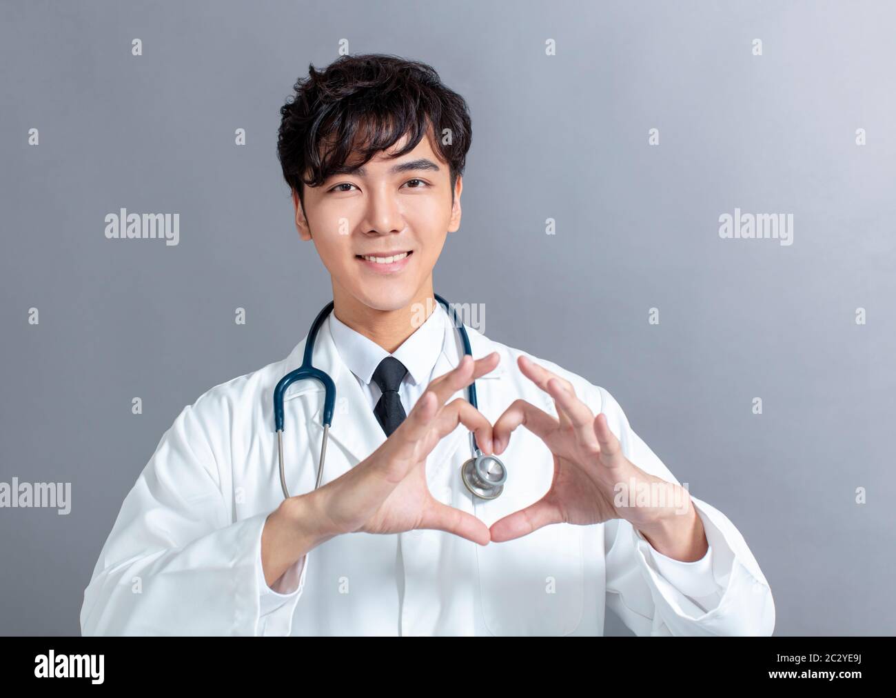 Doctor making heart shape hands hi-res stock photography and images - Alamy